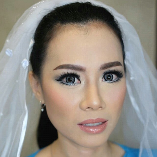Noviane Makeup Artist | Wedding Hair & Makeup in Jakarta | Bridestory.com